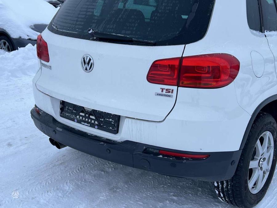 White Volkswagen Tiguan 2012 in Kedainiai, with an engine capacity of 1.40 L and mileage of 276 thousand km for 7450 €, photo 11 on AUTOMOTO.COM.LV