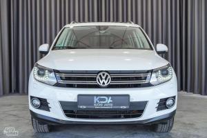 White Volkswagen Tiguan 2012 in Marijampole, with an engine capacity of 2.00 L and mileage of 256 thousand km for 9950 €, photo 4 on AUTOMOTO.COM.LV
