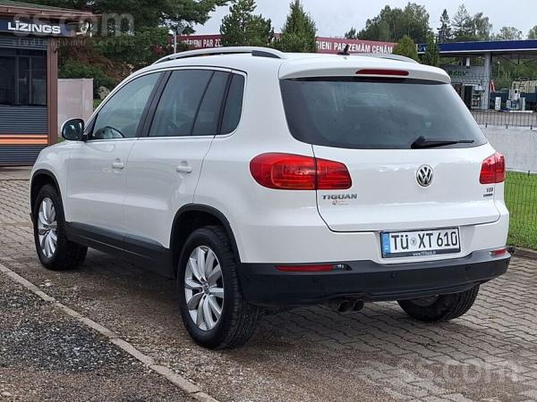 White Volkswagen Tiguan 2012 in Cesis, with an engine capacity of 2.00 L and mileage of 255 thousand km for 8600 €, photo 7 on AUTOMOTO.COM.LV