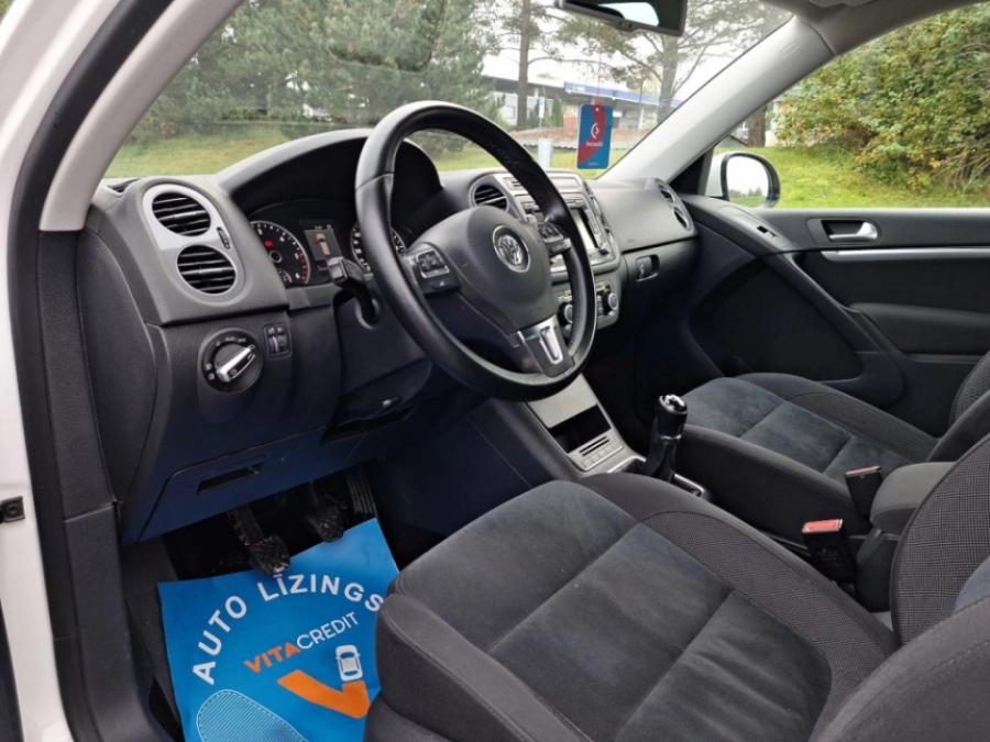 Balts Volkswagen Tiguan 2012 Rīga, ar dzinēja tilpumu 2.00 L un nobraukumu 255 tūkst. km par 8500 €, foto 63 vietnē AUTOMOTO.COM.LV