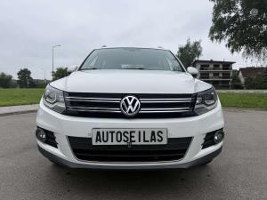 White Volkswagen Tiguan 2012 in Kaunas, with an engine capacity of 1.97 L and mileage of 263 thousand km for 8444 €, photo 4 on AUTOMOTO.COM.LV