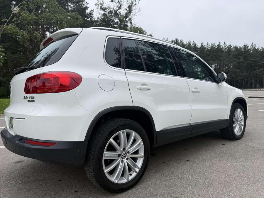 White Volkswagen Tiguan 2012 in Kaunas, with an engine capacity of 1.97 L and mileage of 263 thousand km for 8444 €, photo 8 on AUTOMOTO.COM.LV