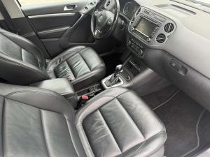White Volkswagen Tiguan 2012 in Kaunas, with an engine capacity of 1.97 L and mileage of 263 thousand km for 8444 €, photo 14 on AUTOMOTO.COM.LV