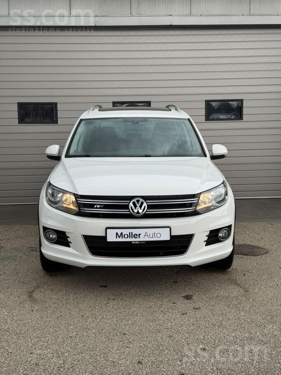 White Volkswagen Tiguan 2012 in Jelgava, with an engine capacity of 1.40 L and mileage of 169 thousand km for 10990 €, photo 4 on AUTOMOTO.COM.LV