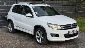 White Volkswagen Tiguan 2012 in Jonava, with an engine capacity of 1.97 L and mileage of 226 thousand km for 7900 €, photo 4 on AUTOMOTO.COM.LV