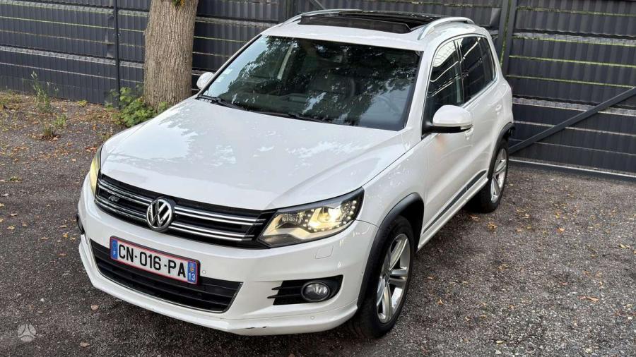 White Volkswagen Tiguan 2012 in Jonava, with an engine capacity of 1.97 L and mileage of 226 thousand km for 7900 €, photo 10 on AUTOMOTO.COM.LV