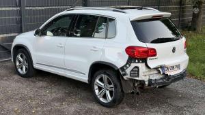 White Volkswagen Tiguan 2012 in Jonava, with an engine capacity of 1.97 L and mileage of 226 thousand km for 7900 €, photo 16 on AUTOMOTO.COM.LV