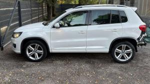 White Volkswagen Tiguan 2012 in Jonava, with an engine capacity of 1.97 L and mileage of 226 thousand km for 7700 €, photo 9 on AUTOMOTO.COM.LV