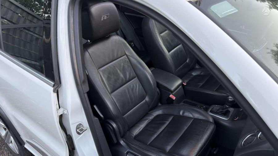 White Volkswagen Tiguan 2012 in Jonava, with an engine capacity of 1.97 L and mileage of 226 thousand km for 7700 €, photo 19 on AUTOMOTO.COM.LV