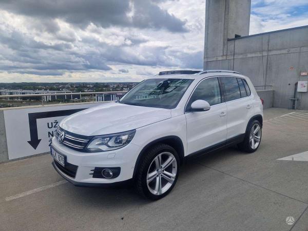 White Volkswagen Tiguan 2012 in Vilnius, with an engine capacity of 1.97 L and mileage of 202 thousand km for 8550 €, photo 1 on AUTOMOTO.COM.LV