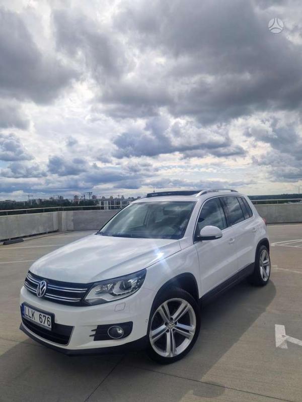 White Volkswagen Tiguan 2012 in Vilnius, with an engine capacity of 1.97 L and mileage of 202 thousand km for 8550 €, photo 11 on AUTOMOTO.COM.LV