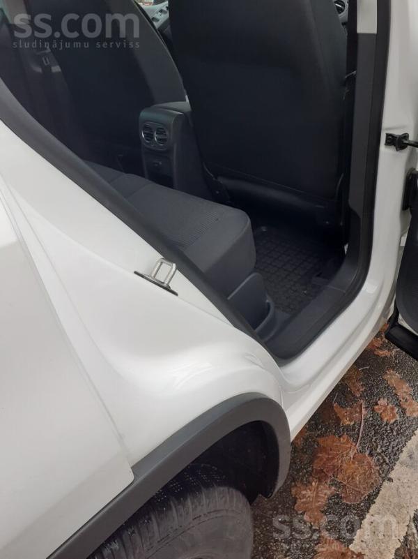 White Volkswagen Tiguan 2012 in Jurmala, with an engine capacity of 1.40 L and mileage of 71 thousand km for 13850 €, photo 8 on AUTOMOTO.COM.LV