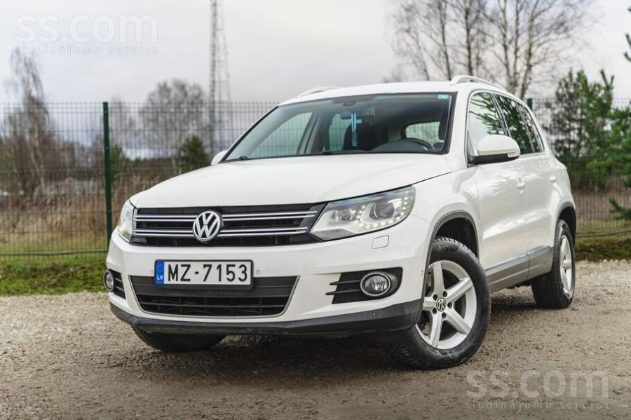 White Volkswagen Tiguan 2013 in Riga, with an engine capacity of 2.00 L and mileage of 425 thousand km for 8490 €, photo 1 on AUTOMOTO.COM.LV