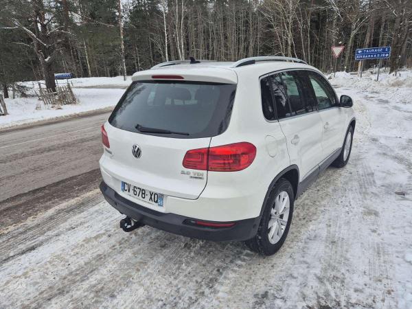 White Volkswagen Tiguan 2013 in Taurage, with an engine capacity of 1.97 L and mileage of 265 thousand km for 8400 €, photo 4 on AUTOMOTO.COM.LV