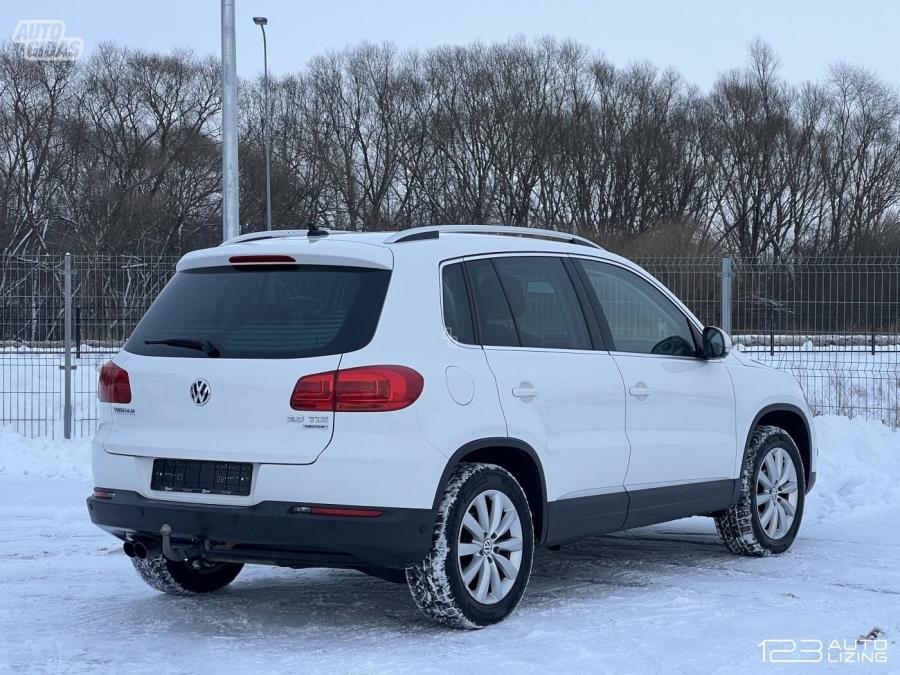 White Volkswagen Tiguan 2013 in Taurage, with an engine capacity of 2.00 L and mileage of 271 thousand km for 8200 €, photo 6 on AUTOMOTO.COM.LV