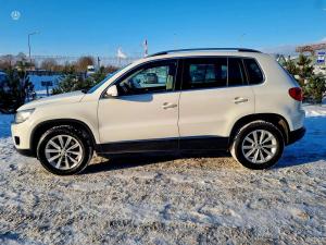 White Volkswagen Tiguan 2013 in Siauliai, with an engine capacity of 1.97 L and mileage of 234 thousand km for 9200 €, photo 7 on AUTOMOTO.COM.LV