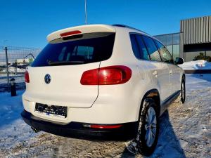 White Volkswagen Tiguan 2013 in Siauliai, with an engine capacity of 1.97 L and mileage of 234 thousand km for 9200 €, photo 12 on AUTOMOTO.COM.LV