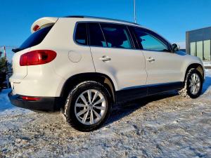 White Volkswagen Tiguan 2013 in Siauliai, with an engine capacity of 1.97 L and mileage of 234 thousand km for 9200 €, photo 13 on AUTOMOTO.COM.LV