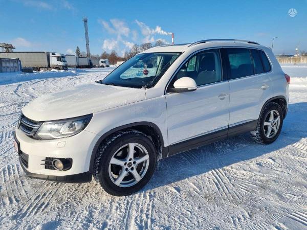 White Volkswagen Tiguan 2013 in Siauliai, with an engine capacity of 1.97 L and mileage of 234 thousand km for 9200 €, photo 2 on AUTOMOTO.COM.LV