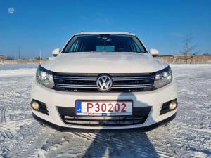 White Volkswagen Tiguan 2013 in Siauliai, with an engine capacity of 1.97 L and mileage of 234 thousand km for 9200 €, photo 3 on AUTOMOTO.COM.LV