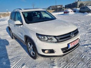White Volkswagen Tiguan 2013 in Siauliai, with an engine capacity of 1.97 L and mileage of 234 thousand km for 9200 €, photo 5 on AUTOMOTO.COM.LV
