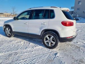 White Volkswagen Tiguan 2013 in Siauliai, with an engine capacity of 1.97 L and mileage of 234 thousand km for 9200 €, photo 12 on AUTOMOTO.COM.LV