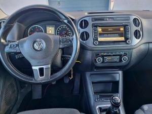 White Volkswagen Tiguan 2013 in Siauliai, with an engine capacity of 1.97 L and mileage of 234 thousand km for 9200 €, photo 20 on AUTOMOTO.COM.LV