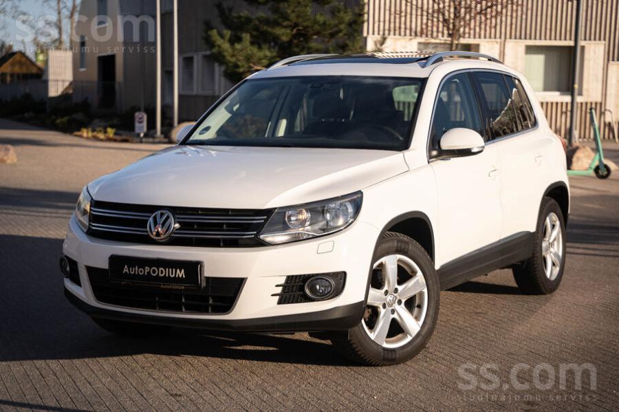 White Volkswagen Tiguan 2013 in Riga, with an engine capacity of 1.40 L and mileage of 235 thousand km for 7990 €, photo 1 on AUTOMOTO.COM.LV