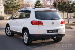 White Volkswagen Tiguan 2013 in Riga, with an engine capacity of 1.40 L and mileage of 235 thousand km for 7990 €, photo 3 on AUTOMOTO.COM.LV