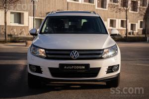 White Volkswagen Tiguan 2013 in Riga, with an engine capacity of 1.40 L and mileage of 235 thousand km for 7990 €, photo 4 on AUTOMOTO.COM.LV