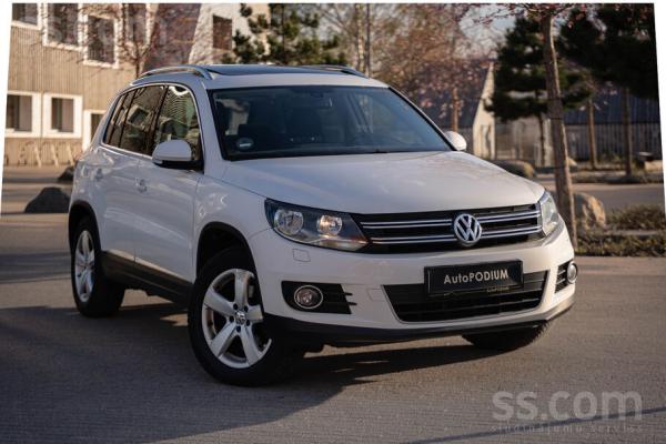 White Volkswagen Tiguan 2013 in Riga, with an engine capacity of 1.40 L and mileage of 235 thousand km for 7990 €, photo 5 on AUTOMOTO.COM.LV