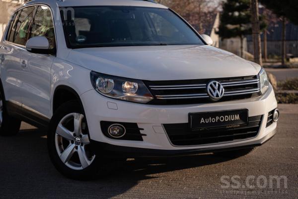 White Volkswagen Tiguan 2013 in Riga, with an engine capacity of 1.40 L and mileage of 235 thousand km for 7990 €, photo 6 on AUTOMOTO.COM.LV
