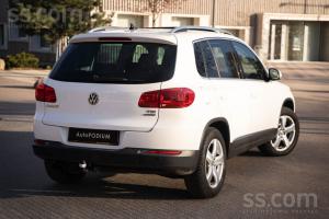 White Volkswagen Tiguan 2013 in Riga, with an engine capacity of 1.40 L and mileage of 235 thousand km for 7990 €, photo 8 on AUTOMOTO.COM.LV
