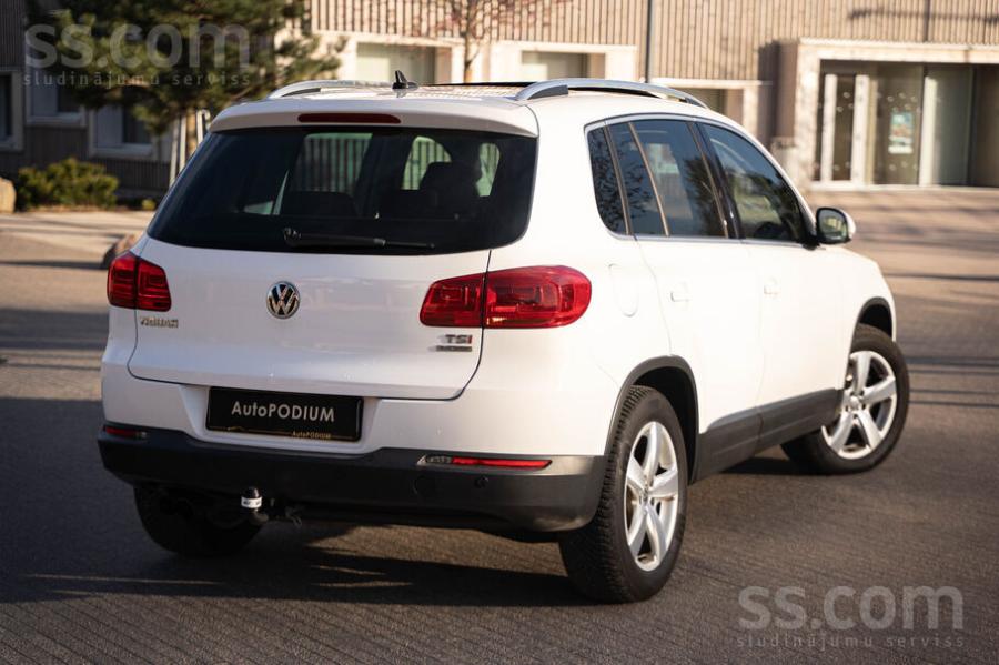 White Volkswagen Tiguan 2013 in Riga, with an engine capacity of 1.40 L and mileage of 235 thousand km for 7990 €, photo 8 on AUTOMOTO.COM.LV