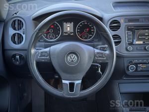 White Volkswagen Tiguan 2013 in Riga, with an engine capacity of 1.40 L and mileage of 235 thousand km for 7990 €, photo 10 on AUTOMOTO.COM.LV