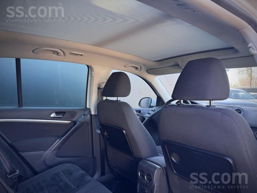 White Volkswagen Tiguan 2013 in Riga, with an engine capacity of 1.40 L and mileage of 235 thousand km for 7990 €, photo 21 on AUTOMOTO.COM.LV