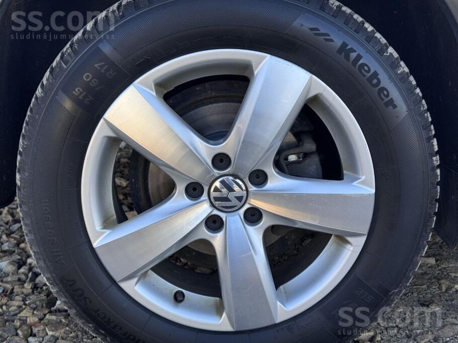 White Volkswagen Tiguan 2013 in Riga, with an engine capacity of 1.40 L and mileage of 235 thousand km for 7990 €, photo 24 on AUTOMOTO.COM.LV