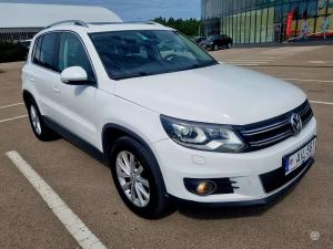 White Volkswagen Tiguan 2013 in Siauliai, with an engine capacity of 1.97 L and mileage of 237 thousand km for 9700 €, photo  on AUTOMOTO.COM.LV