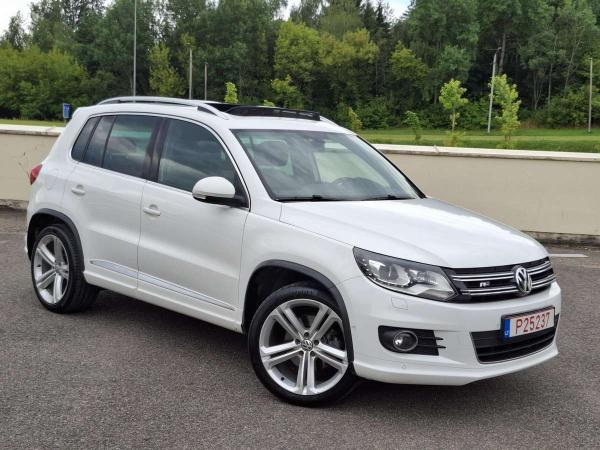 White Volkswagen Tiguan 2013 in Vilnius, with an engine capacity of 1.97 L and mileage of 244 thousand km for 10500 €, photo 1 on AUTOMOTO.COM.LV