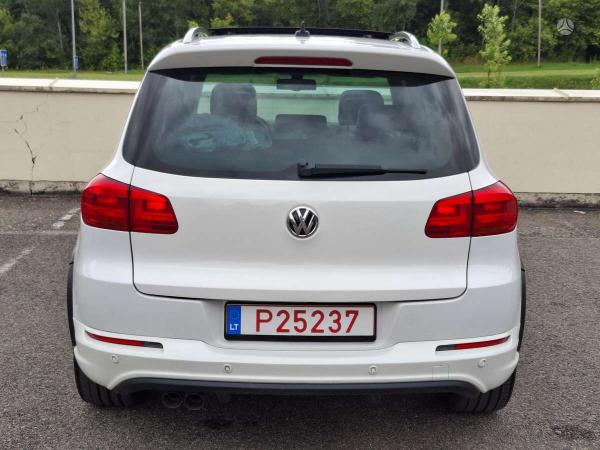 White Volkswagen Tiguan 2013 in Vilnius, with an engine capacity of 1.97 L and mileage of 244 thousand km for 10500 €, photo 9 on AUTOMOTO.COM.LV