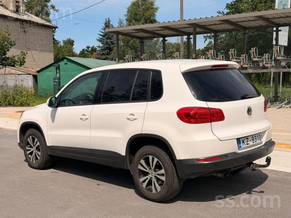 Balts Volkswagen Tiguan 2013 Rīga, ar dzinēja tilpumu 2.00 L un nobraukumu 254 tūkst. km par 9400 €, foto 6 vietnē AUTOMOTO.COM.LV