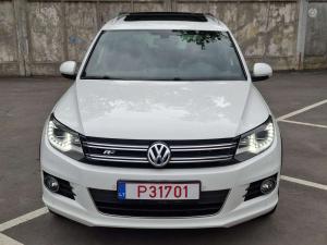 White Volkswagen Tiguan 2013 in Vilnius, with an engine capacity of 1.97 L and mileage of 244 thousand km for 10400 €, photo 9 on AUTOMOTO.COM.LV