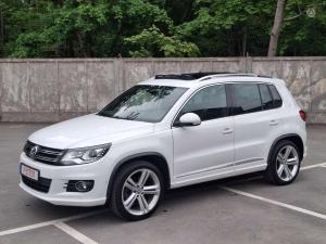 White Volkswagen Tiguan 2013 in Vilnius, with an engine capacity of 1.97 L and mileage of 244 thousand km for 10400 €, photo 11 on AUTOMOTO.COM.LV