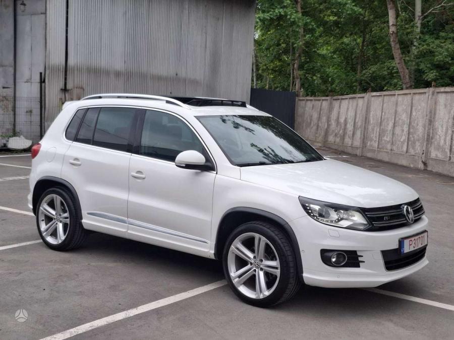 White Volkswagen Tiguan 2013 in Vilnius, with an engine capacity of 1.97 L and mileage of 244 thousand km for 10400 €, photo 13 on AUTOMOTO.COM.LV