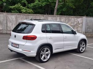 White Volkswagen Tiguan 2013 in Vilnius, with an engine capacity of 1.97 L and mileage of 244 thousand km for 10400 €, photo 14 on AUTOMOTO.COM.LV