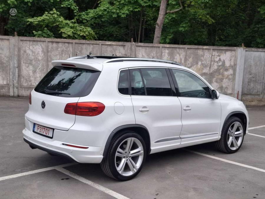 White Volkswagen Tiguan 2013 in Vilnius, with an engine capacity of 1.97 L and mileage of 244 thousand km for 10400 €, photo 14 on AUTOMOTO.COM.LV