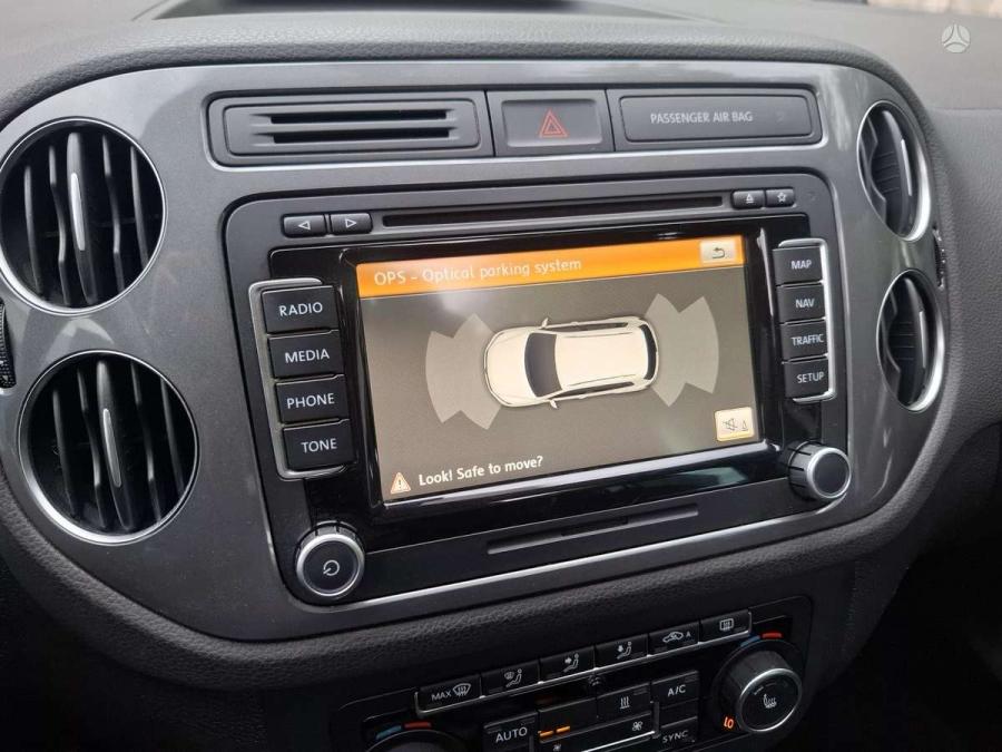 White Volkswagen Tiguan 2013 in Vilnius, with an engine capacity of 1.97 L and mileage of 244 thousand km for 10400 €, photo 24 on AUTOMOTO.COM.LV