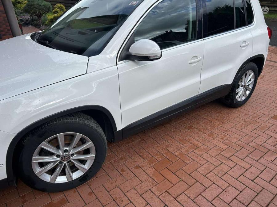 White Volkswagen Tiguan 2013 in Kaunas, with an engine capacity of 1.97 L and mileage of 248 thousand km for 8300 €, photo 4 on AUTOMOTO.COM.LV