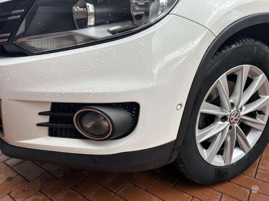 White Volkswagen Tiguan 2013 in Kaunas, with an engine capacity of 1.97 L and mileage of 248 thousand km for 8300 €, photo 21 on AUTOMOTO.COM.LV