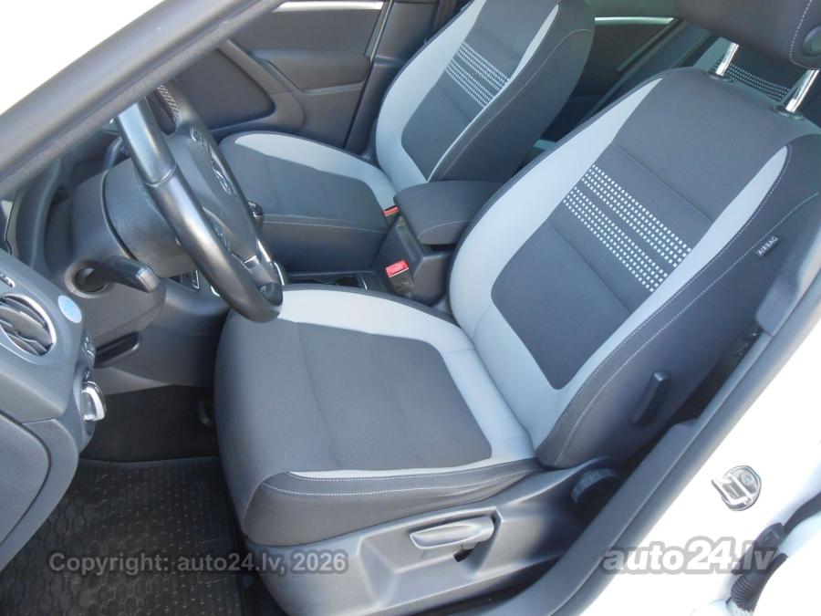 White Volkswagen Tiguan 2013 in Viljandi, with an engine capacity of 2.00 L and mileage of 226 thousand km for 8990 €, photo 9 on AUTOMOTO.COM.LV